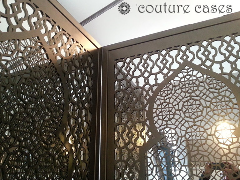 Decorative mirror screens in Islamic inspired designs creating flexible ...