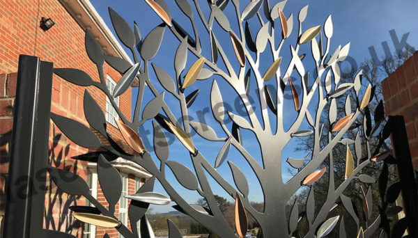 Decorative laser cut gates in 3D tree design with metallic leaves ...